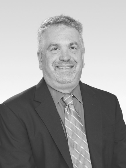 A professional portrait of Eric M. Anderman.